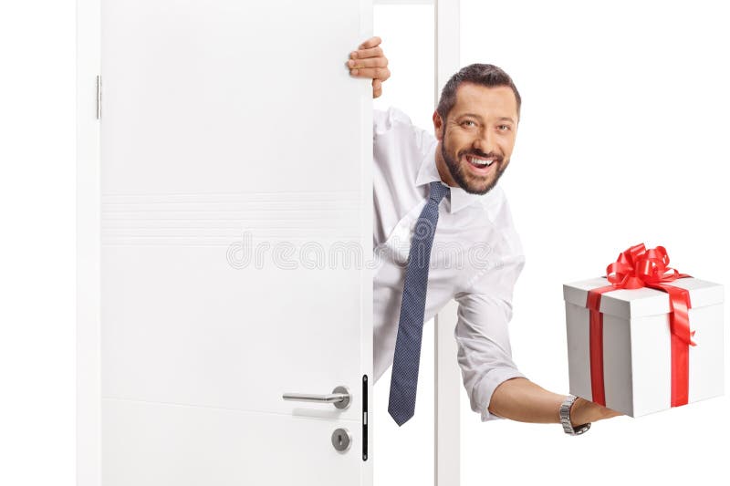 Man Opening a Door and Holding a Gift Box Stock Image - Image of ...