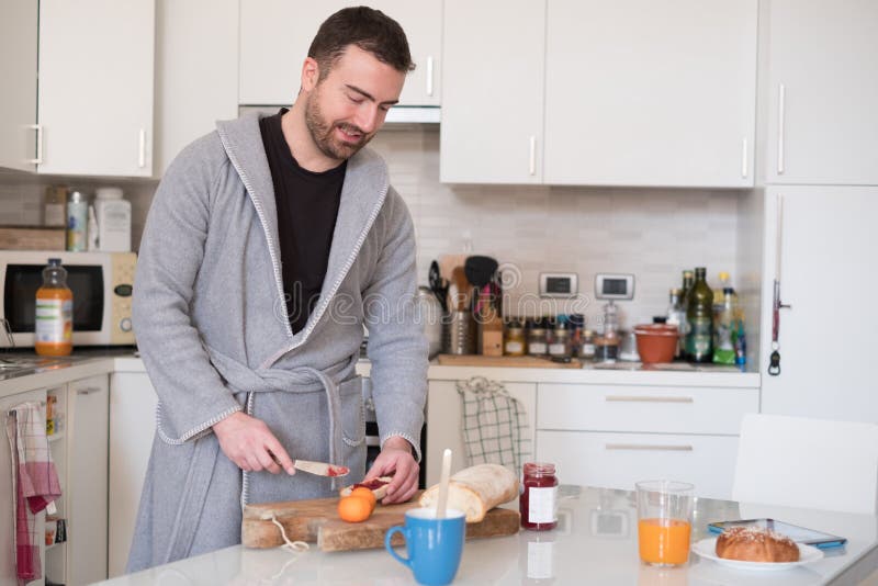 Cheerful Man Preparing an Healthy Breakfast in the Morning Stock Photo ...