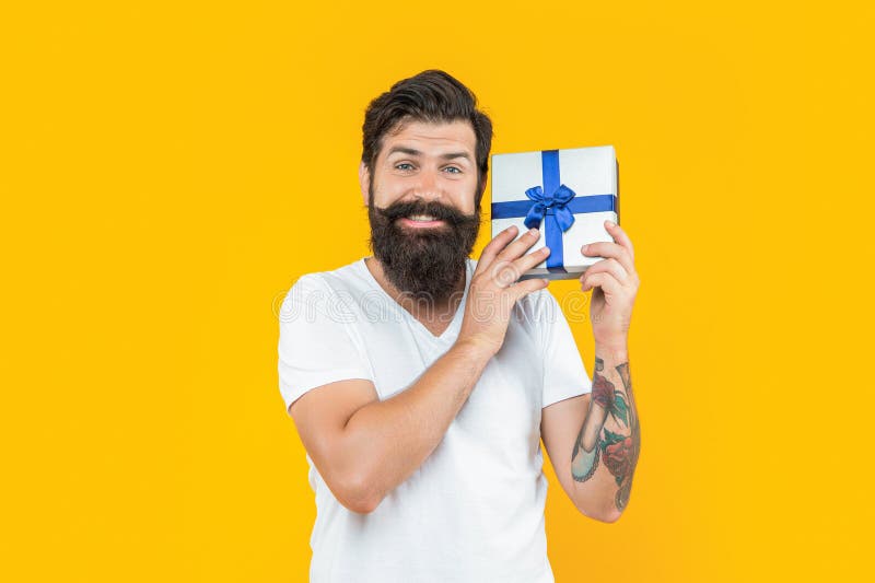 Cheerful Man with Present Box Isolated on Yellow. Man with Present Box ...