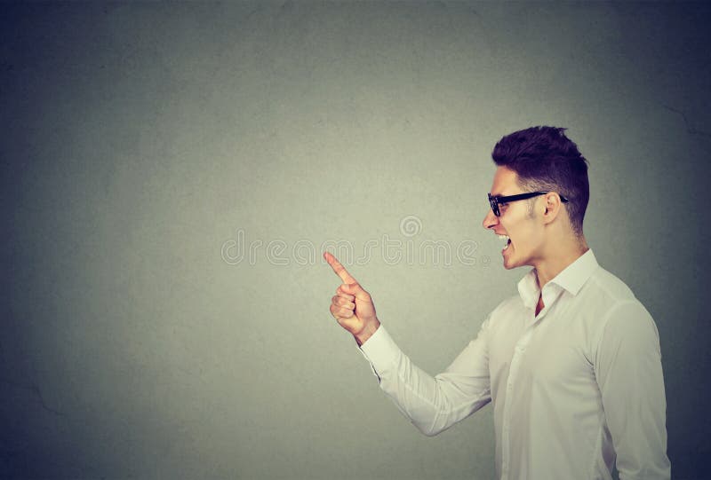 Cheerful Man Showing Direction and Pointing with Finger Stock Image ...
