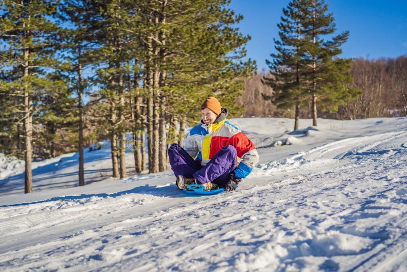 Cheerful Man Sledding Down a Snowy Slope in Full Speed BANNER, LONG ...