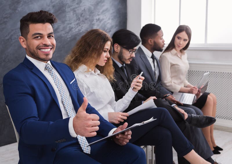Cheerful Man Showing Thumb Up while Waiting in Queue Stock Image ...