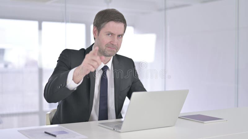 Cheerful Middle Aged Businessman Pointing Finger at Camera Stock Photo ...