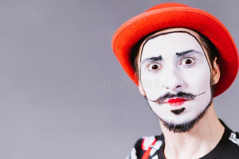 Cheerful Mime Posing and Grimacing in the Studio Stock Image - Image of ...