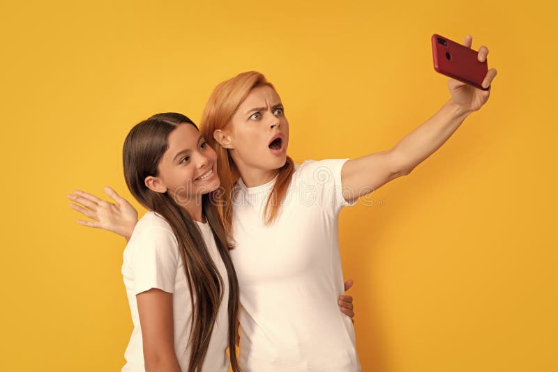 Cheerful Mom and Kid Making Selfie on Smartphone, Shooting Vlog Stock ...