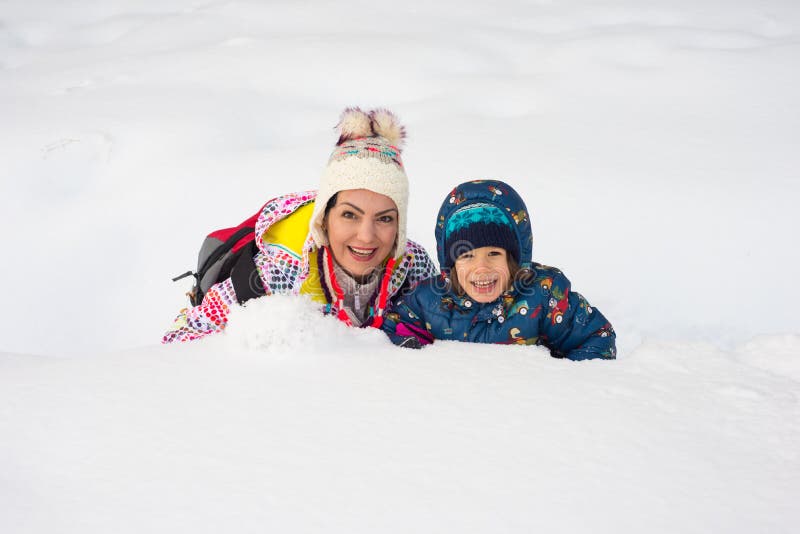 Cheerful Mother and Son in Snow Stock Photo - Image of smile, close ...