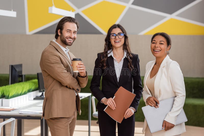 Cheerful Multicultural Managers in Formal Wear Stock Photo - Image of ... Cheerful Multicultural Managers in Formal Wear Stock Photo - Image of ...