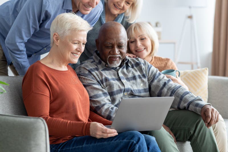 Cheerful Multiracial Senior People Using Computer Together Stock Photo ...
