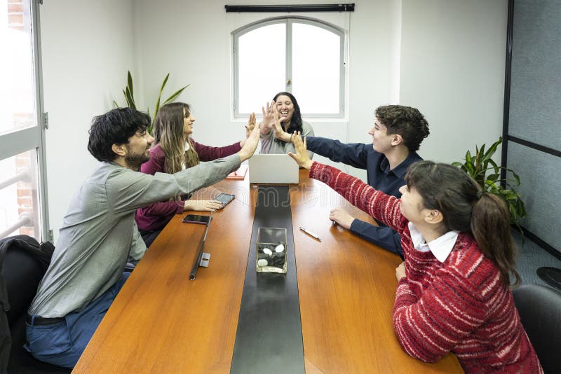 Cheerful office workers stock image. Image of collaboration - 253930017