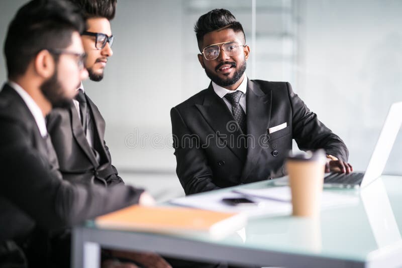 Cheerful Office Workers Discussing Their Project Over Cup of Coffee ...