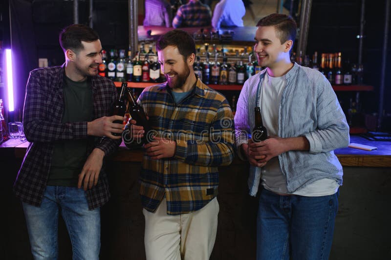 Cheerful Old Friends Having Fun and Drinking Draft Beer in Pub Stock ...