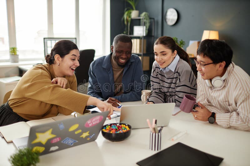 Cheerful People Collaborating during Work Meeting Stock Photo - Image ...