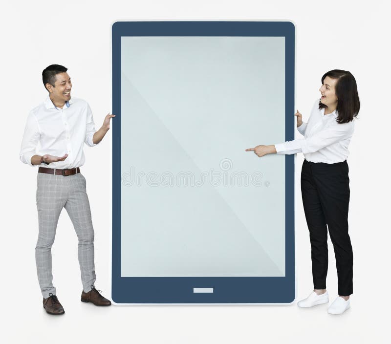 Cheerful People Pointing at a Tablet Screen Stock Image - Image of ...