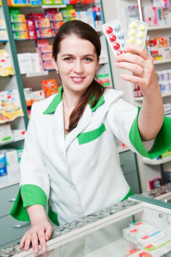Pharmacy Chemist Woman in Drugstore Stock Photo - Image of cheerful ...