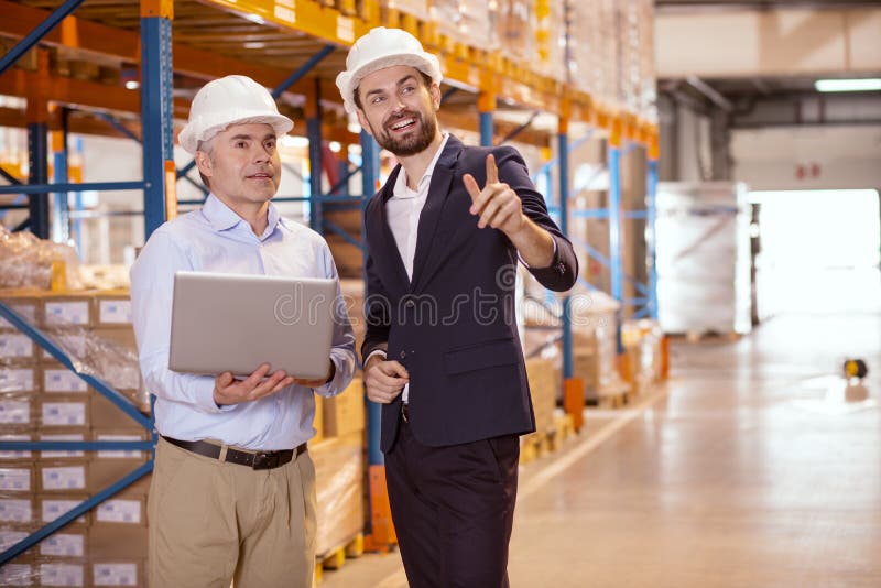 Cheerful Positive Businessman Pointing with His Finger Stock Photo ...