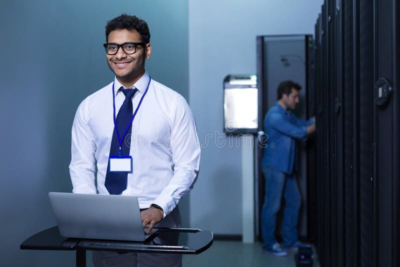 Cheerful Positive Man Working on the Laptop Stock Photo - Image of ...