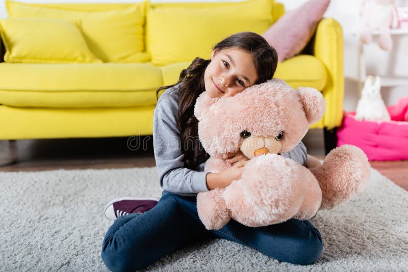Cheerful Preteen Girl Hugging Soft Toy Stock Image - Image of childhood ... Cheerful Preteen Girl Hugging Soft Toy Stock Image - Image of childhood ...