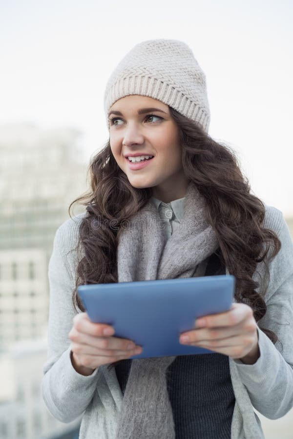 Cheerful Pretty Brunette Holding Her Tablet Stock Image - Image of ...