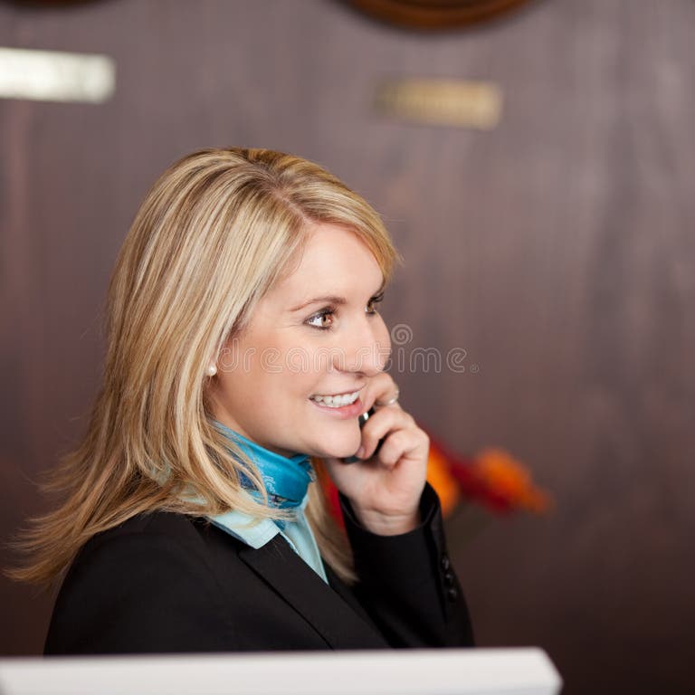 Cheerful Receptionist Using Telephone Stock Image - Image of closeup ...