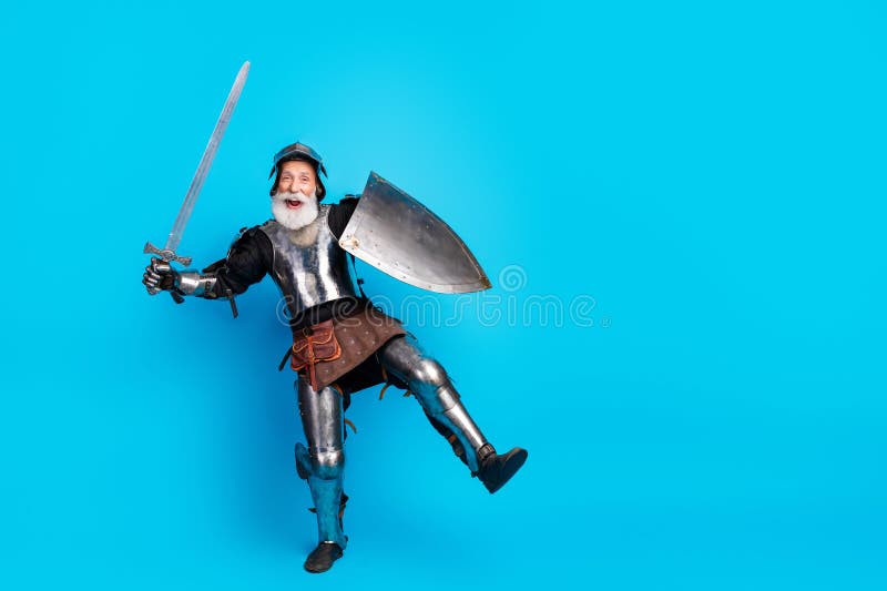 Cheerful Retired Knight Posing in Medieval Armor with Shield and Sword ...