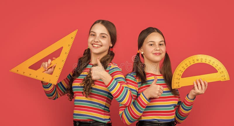 Cheerful School Students Hold Math Tool of Triangle and Protractor ...