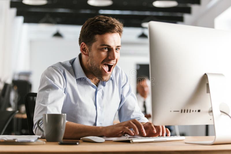 Cheerful Screaming Business Man Using Computer and Rejoices Stock Image ...