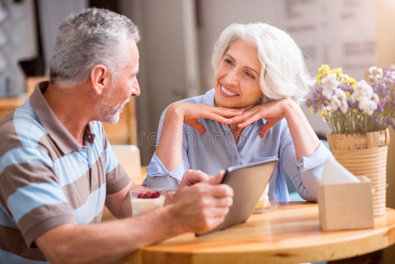 Cheerful Senior Couple Talking Stock Photo - Image of family, cafe ...