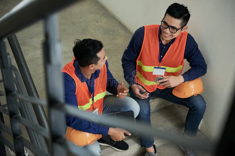 Workers taking break stock image. Image of site, team - 124453641