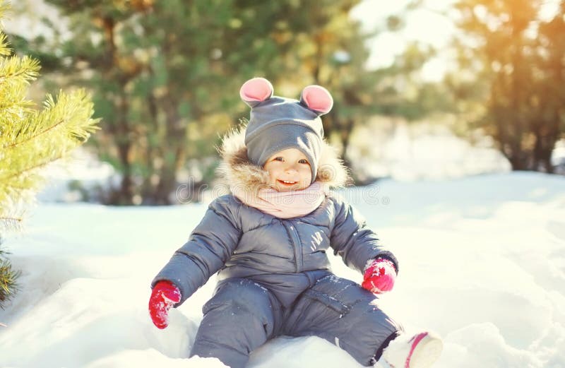 Cheerful Smiling Little Child Playing on Snow in Winter Stock Image ...