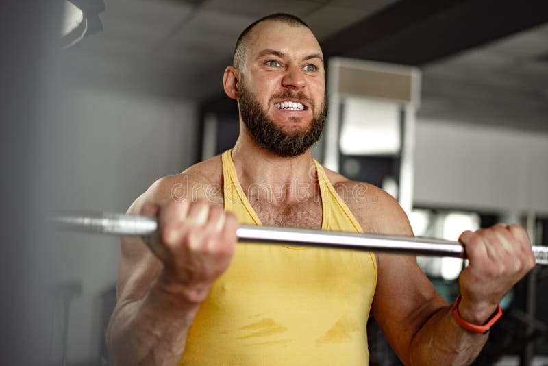 Cheerful Smiling Man Bodybuilder Standing in a Gym Stock Image - Image ...