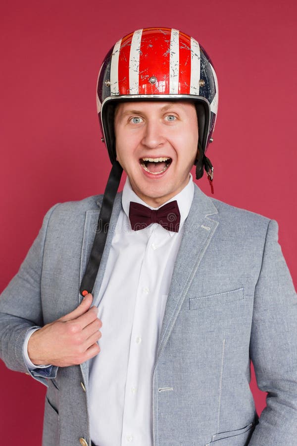 Cheerful Smiling Man with a Helmet on a Background of Color 2022: Very ...