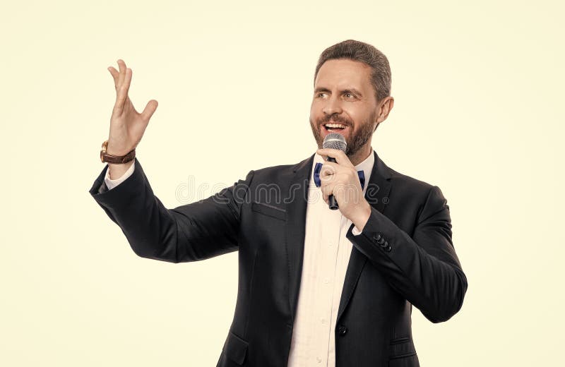 Cheerful Speaker Man with Microphone. Man Speaker Wear Tuxedo in Studio ...
