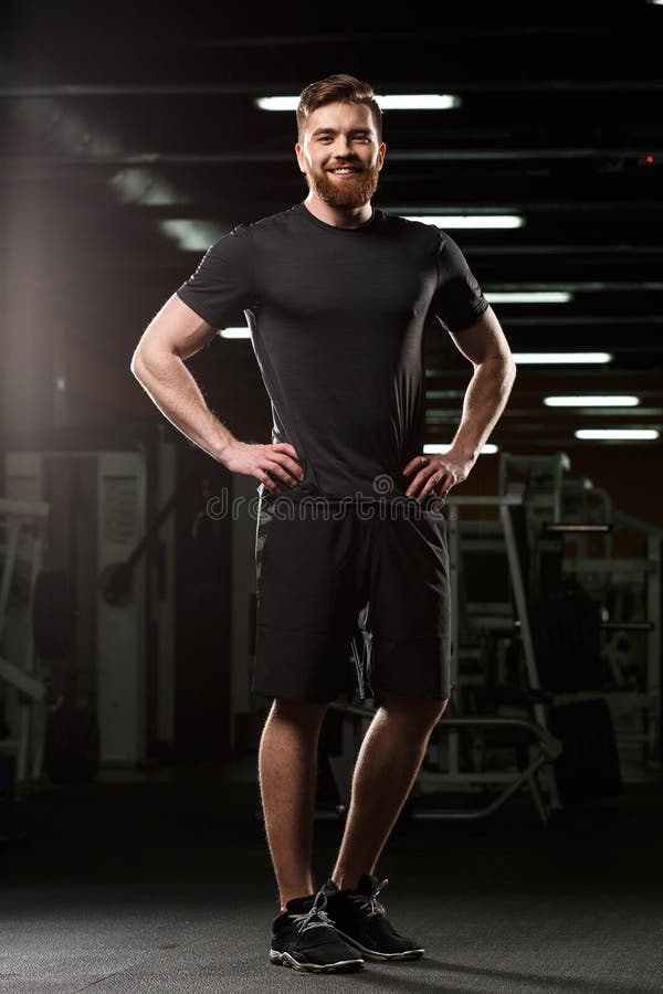 Cheerful Sports Man Standing and Posing in Gym Stock Image - Image of ...