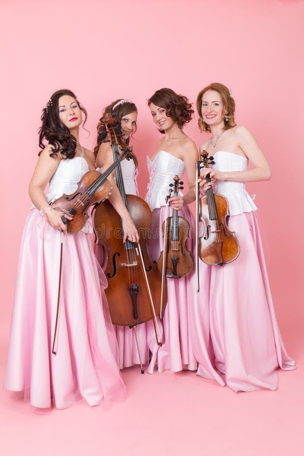 Cheerful string quartet stock image. Image of women - 105843435