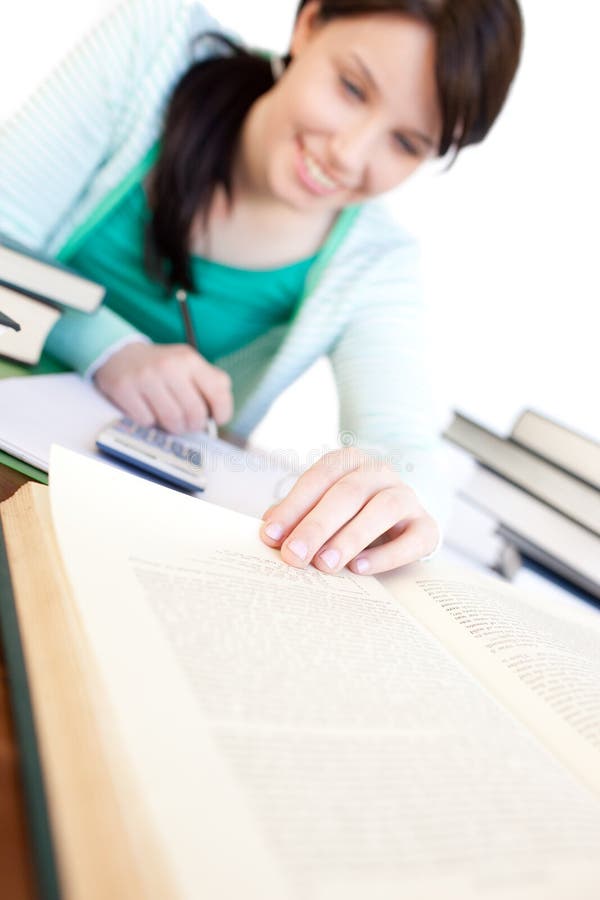 Cheerful Student Doing Her Homework on a Desk Stock Photo - Image of ...