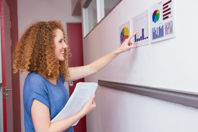 Cheerful Student Pointing the Graphic Stock Image - Image of adult ...