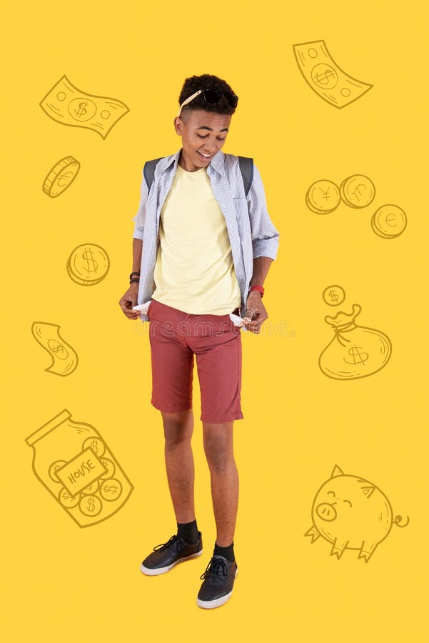 Cheerful Student Smiling while Looking at His Empty Pockets Stock Image ...