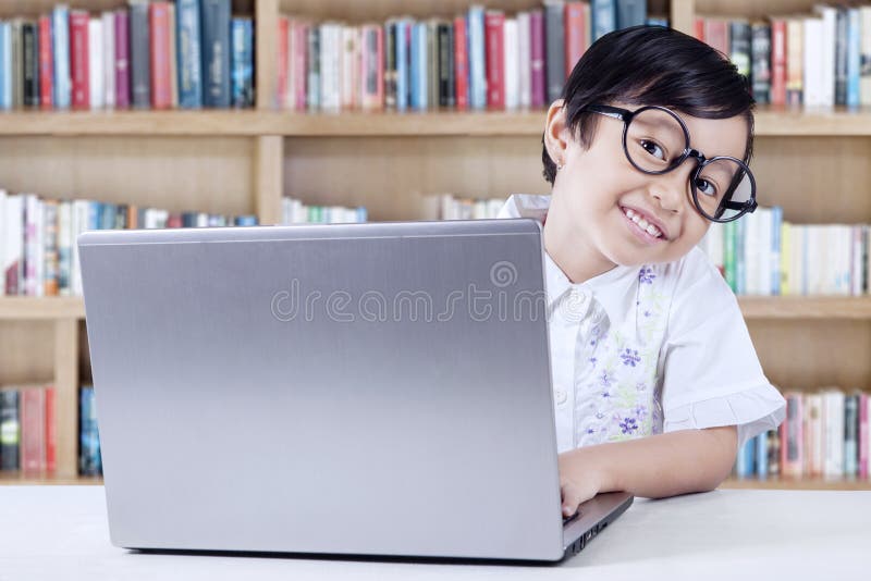 Cheerful Student Using Laptop in the Library Stock Photo - Image of ...