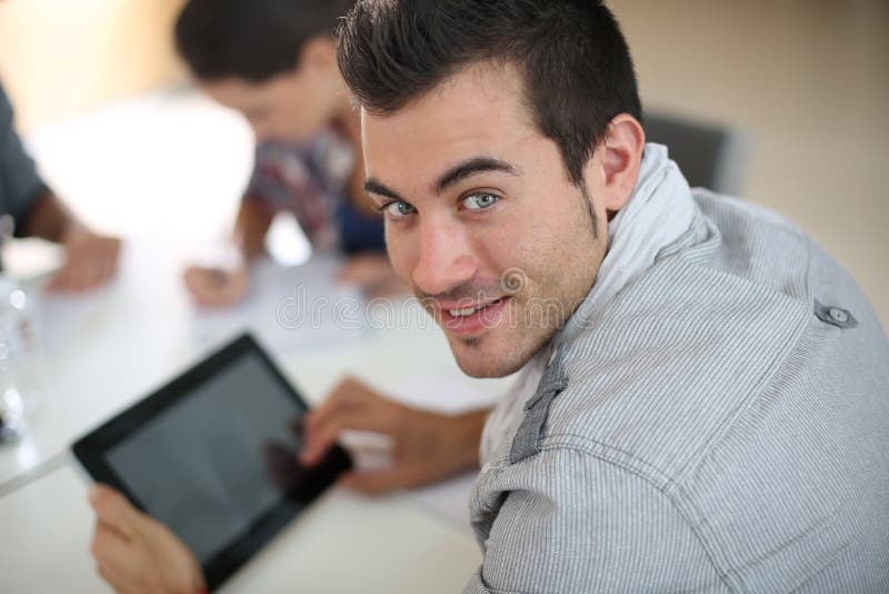 Cheerful Student Using Tablet Stock Photo - Image of training, smile ...