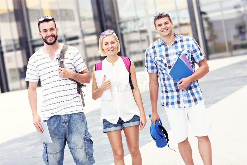 Cheerful Students in the Campus Stock Image - Image of satisfied, back ...