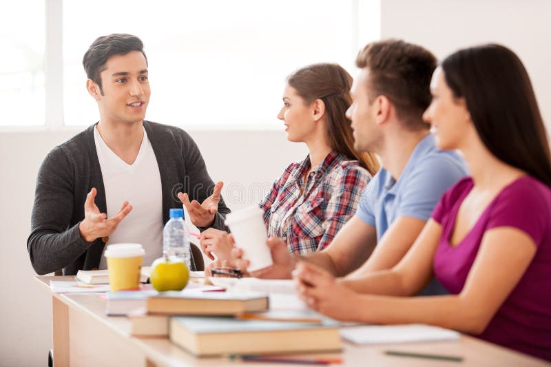 Teacher with College Students Giving Lesson in Classroom Stock Photo ...