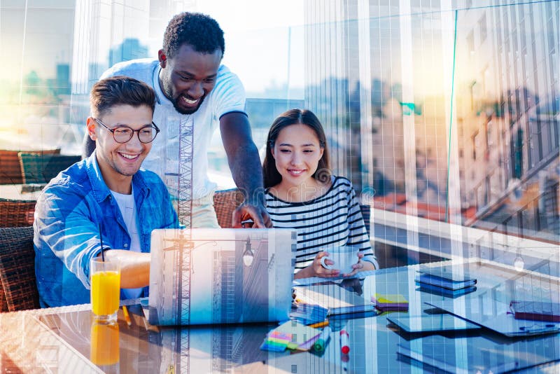 Cheerful Students Having Fun during Preparation for Classes Stock Photo ...