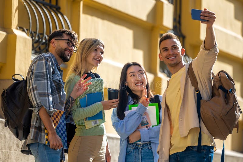 Cheerful Students Making Group Selfie in University Campus after ...