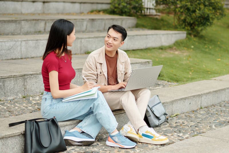 Students Sitting on Campus stock photo. Image of student - 271278984
