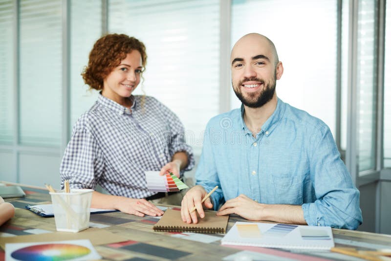 Cheerful Team of Interior Designers Stock Photo - Image of young ...