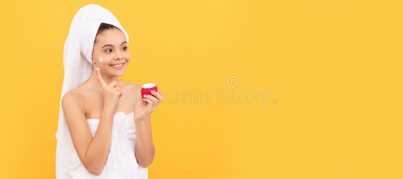 Cheerful Teen Girl In Shower Towel Apply Facial Cream Cosmetics And