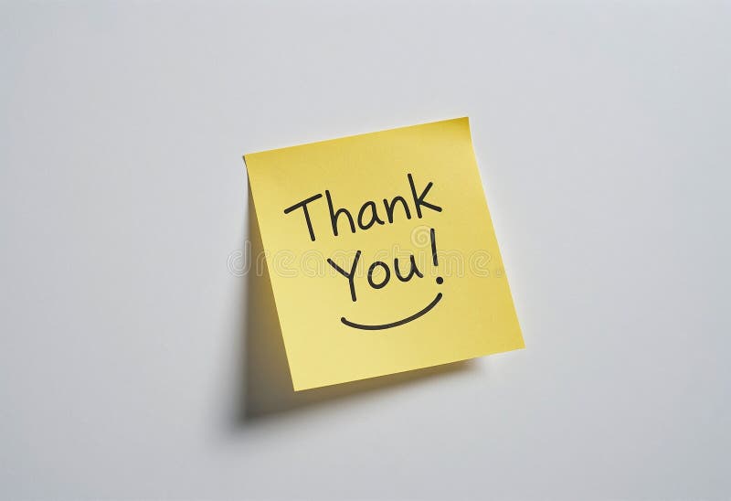 A Cheerful Thank You Note on a Yellow Sticky Note Attached To a White ...