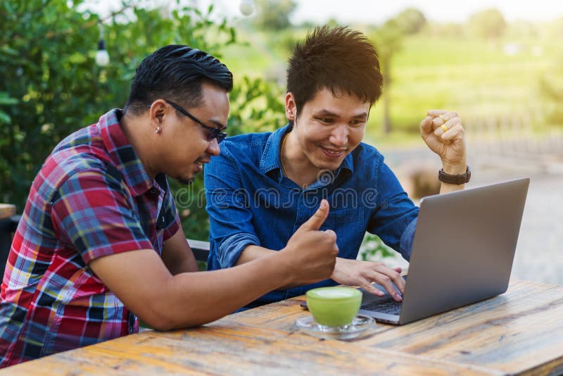 Cheerful Two Man Using and Working on Laptop Computer Stock Image ...