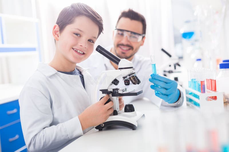 Cheerful Vigorous Boy Discovering Microorganisms Stock Image - Image of ...