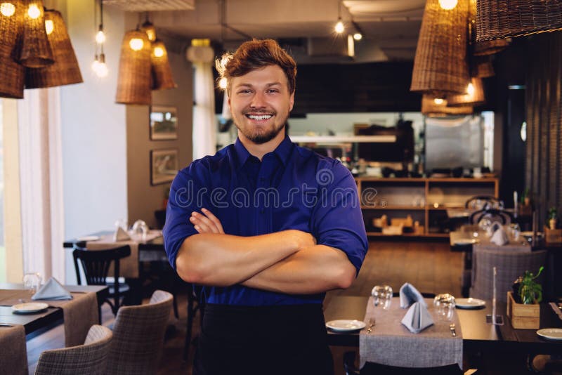 Cheerful Waiter in Modern Restaurant Stock Image - Image of smiling ...